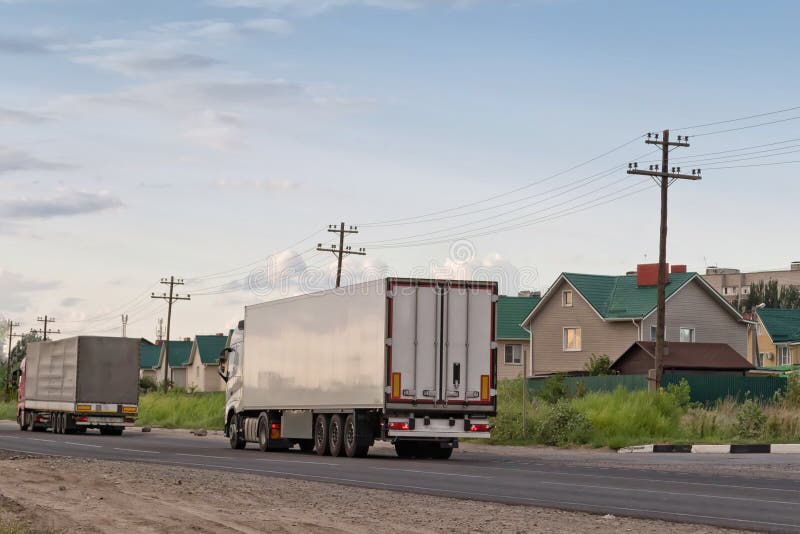 Two White Lorry with White Trailer Over Blue Sky on the Road Stock ...
