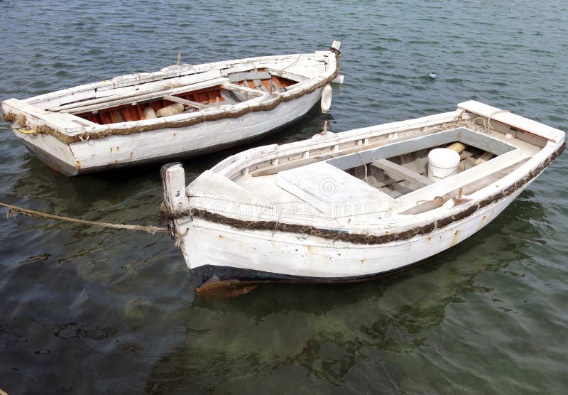 Two White Old Boats in the Middle of the Water Stock Photo - Image of ...