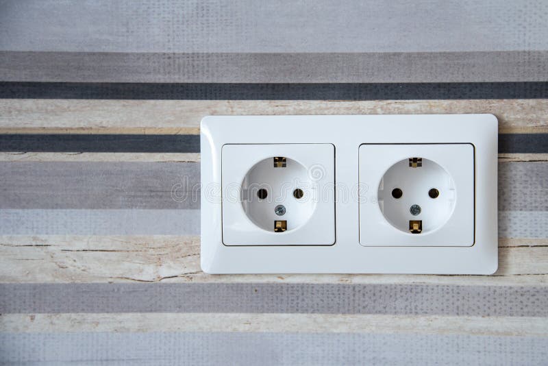 White Plastic Switched Double Socket. Light Switch and Power Socket ...