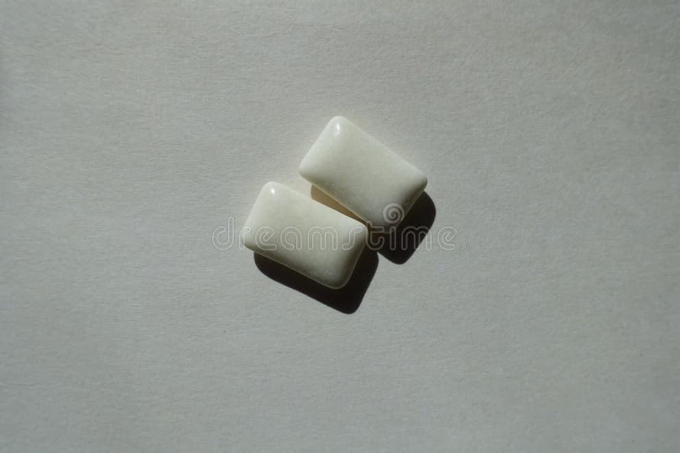 Two White Pieces of Chewing Gum from Above Stock Photo - Image of pair ...