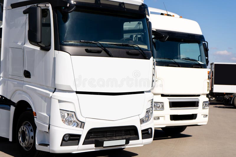 Two white semi trucks stock photo. Image of white, trade - 264261874