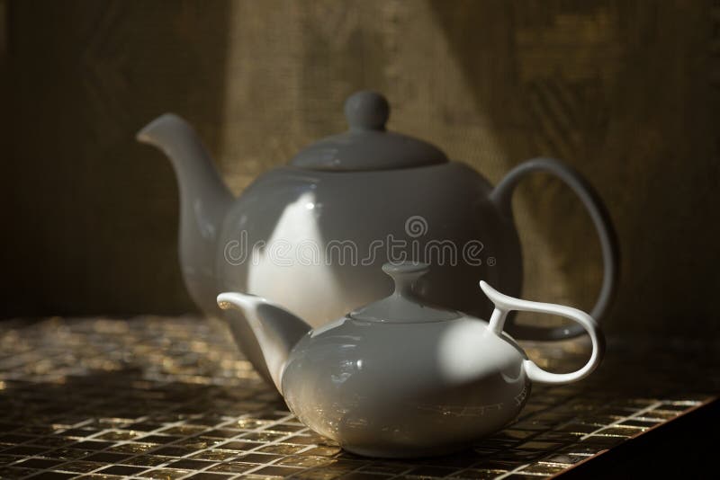 Two white teapots. stock image. Image of teakettle, teapot - 103645063