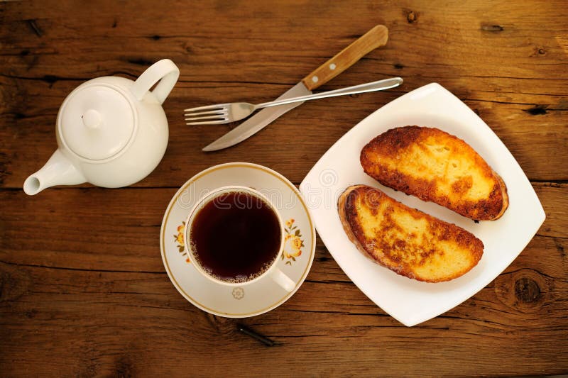 Two White Toasts on White Plate with Cup of Black Tea Stock Image ...