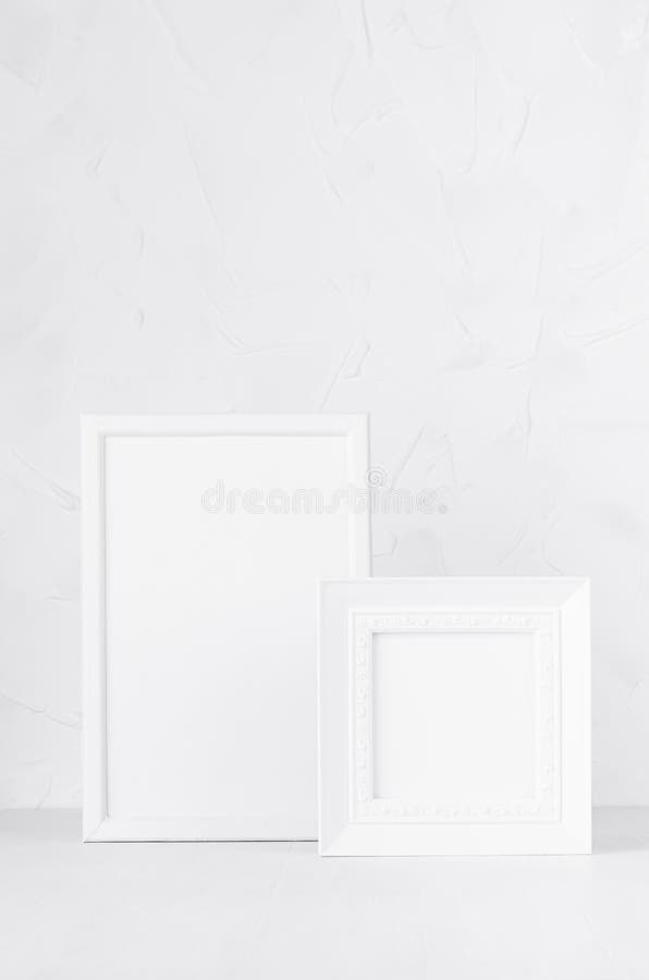 Two White Wood Blank Rectangle and Square Photo Frames on Soft Light ...