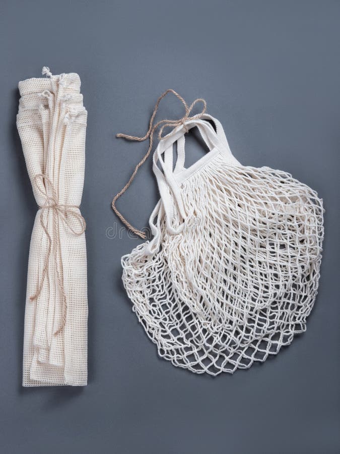 The White Reusable String Bags for Different Products on the Grey ...