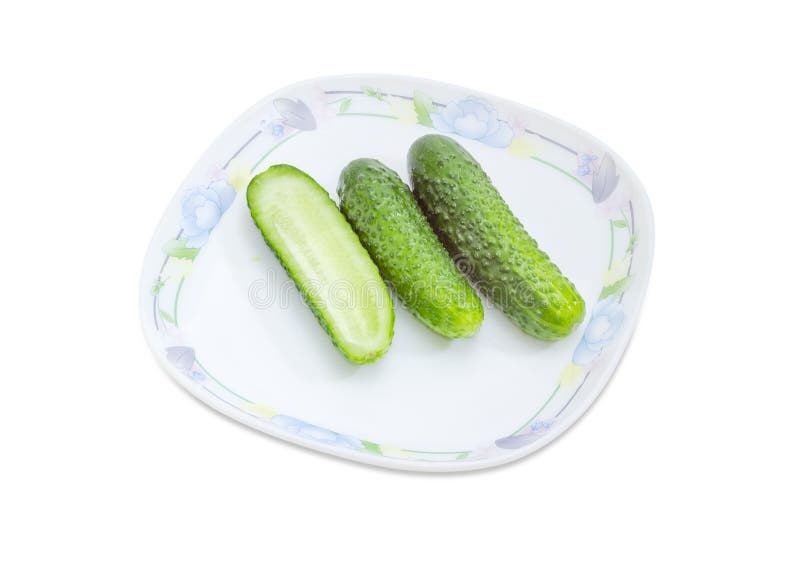 Two Whole and One Half of Cucumber on a Dish Stock Image - Image of ...