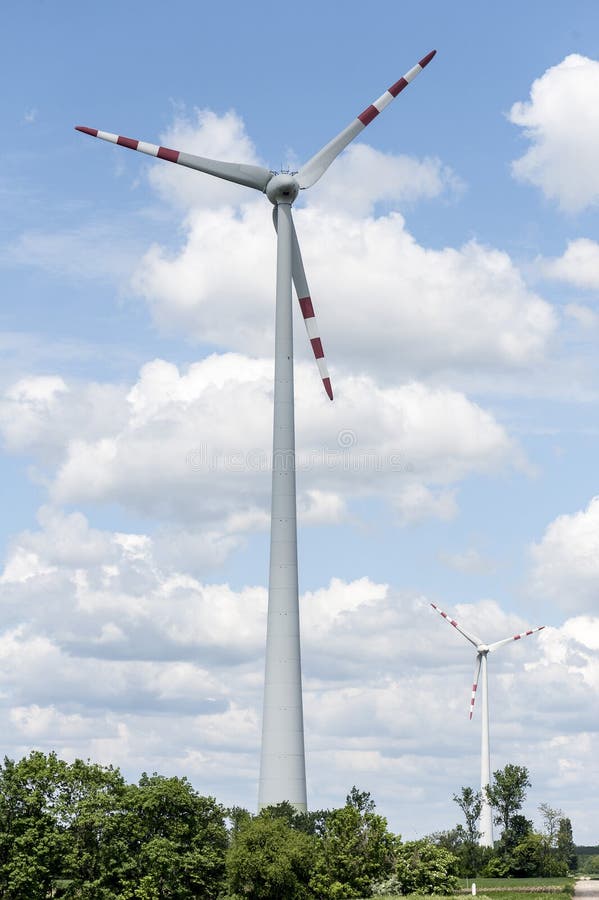 Two Wind Energy Engines Against Clouds Stock Image - Image of farm ...