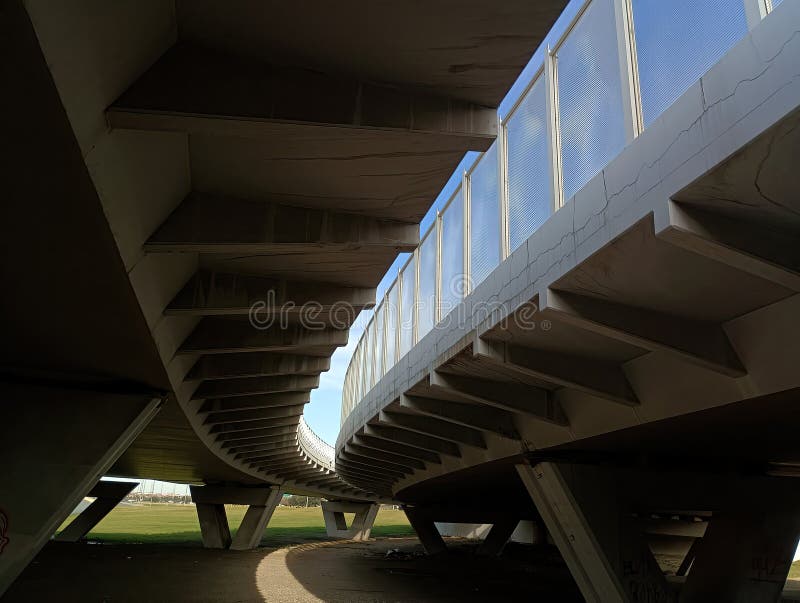 Under Bridge. Bottom View of the Curving Bridge Stock Photo - Image of ...