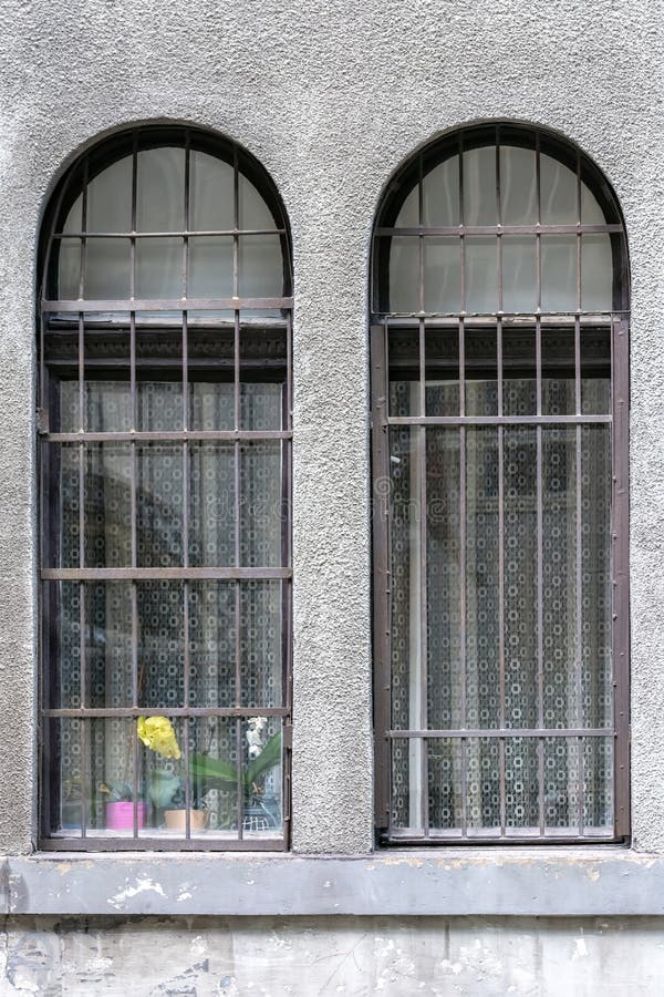 Two windows with bars stock image. Image of architecture - 133922567