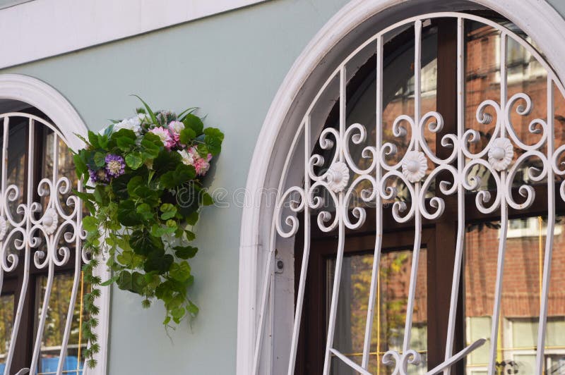 The Windows are Arched, with Beautiful White Wrought Iron Tracery ...