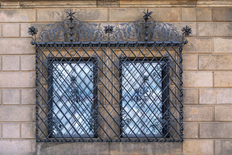 Two windows with bars stock image. Image of style, outdoors - 279621691