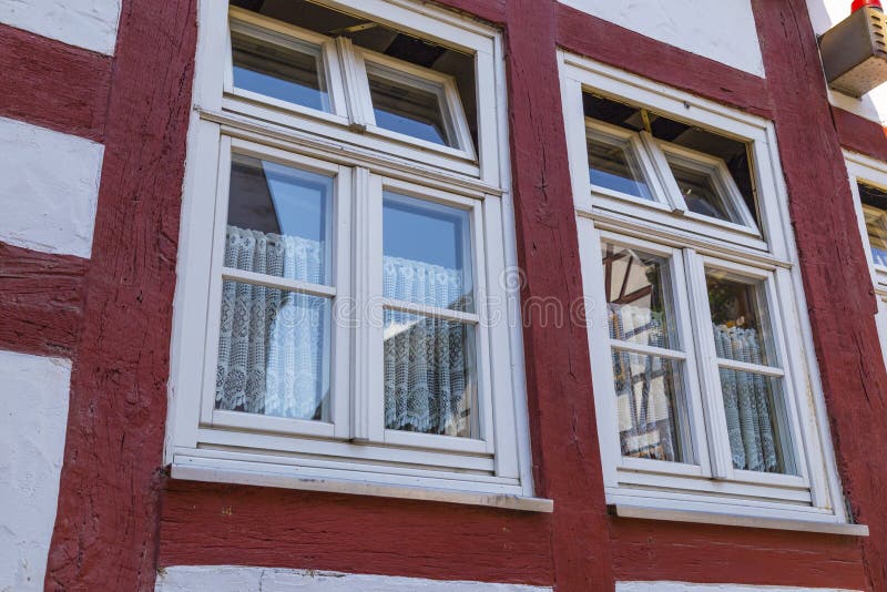 Two Windows on the Facade of Ancient Half-timbered House Stock Photo ...