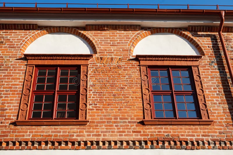 Two Windows in Kaunas, Lithuania Stock Image - Image of brick ... Two Windows in Kaunas, Lithuania Stock Image - Image of brick ...