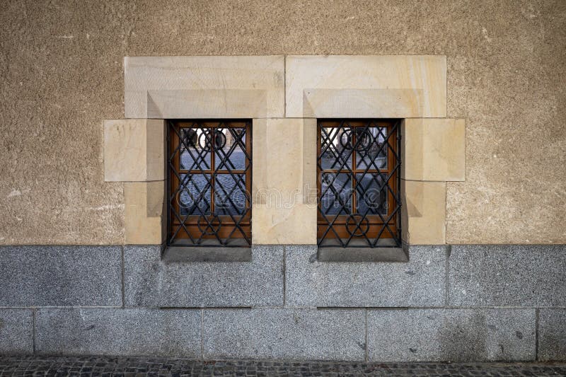 Two Windows of the Old Building Secured with Bars. Stock Photo - Image ...