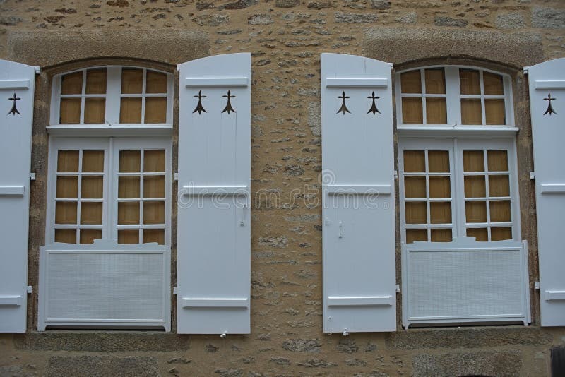 Two Windows with Old Style Blinds on Stone Wall Stock Image - Image of ...
