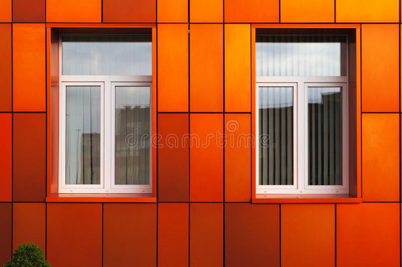 Windows on Orange Wall of Modern Building Stock Image - Image of ...