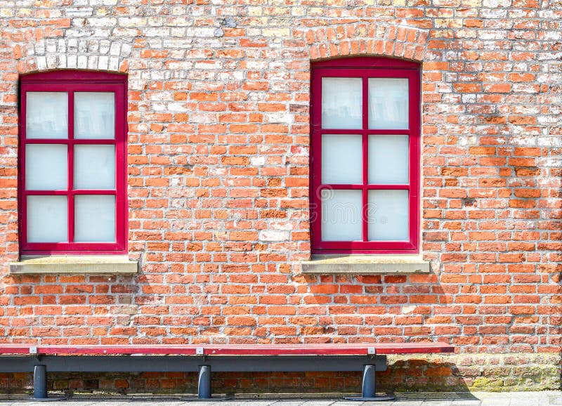 Two Windows with Red Frames in a Brick Wall Stock Image - Image of ...