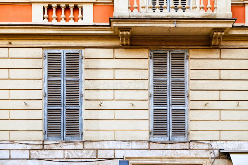 Two Windows Shut with Blue Shutters Stock Photo - Image of shutters ...