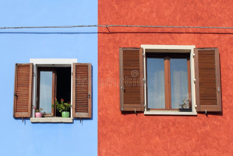 Two Windows with Shutters on Colorful Wall Stock Photo - Image of paint ...