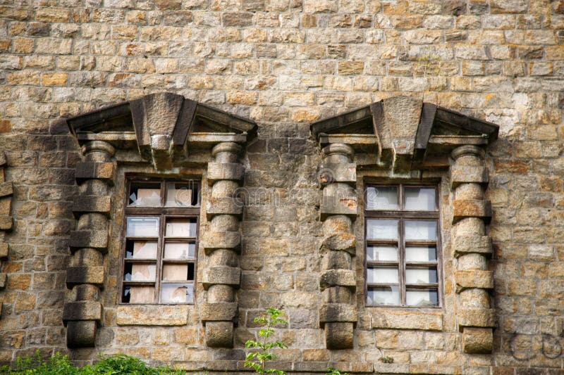 Two Windows on the Side of Building Stock Image - Image of brick ...
