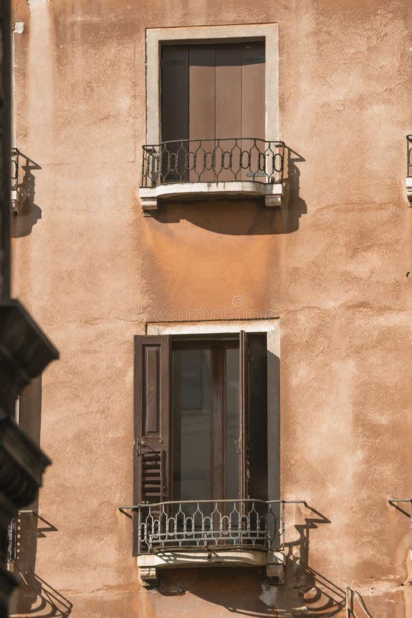 Two windows on wall stock photo. Image of italy, exterior - 108735570