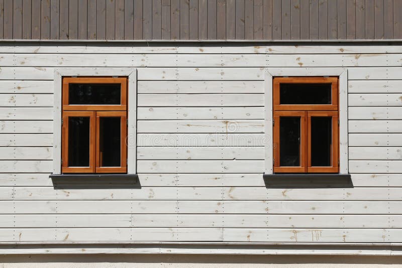 Two Windows on White Wooden Wall Stock Image - Image of building ...
