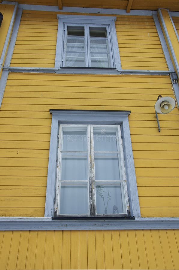 Two Windows in a Yellow Wall of a Building Stock Photo - Image of urban ...