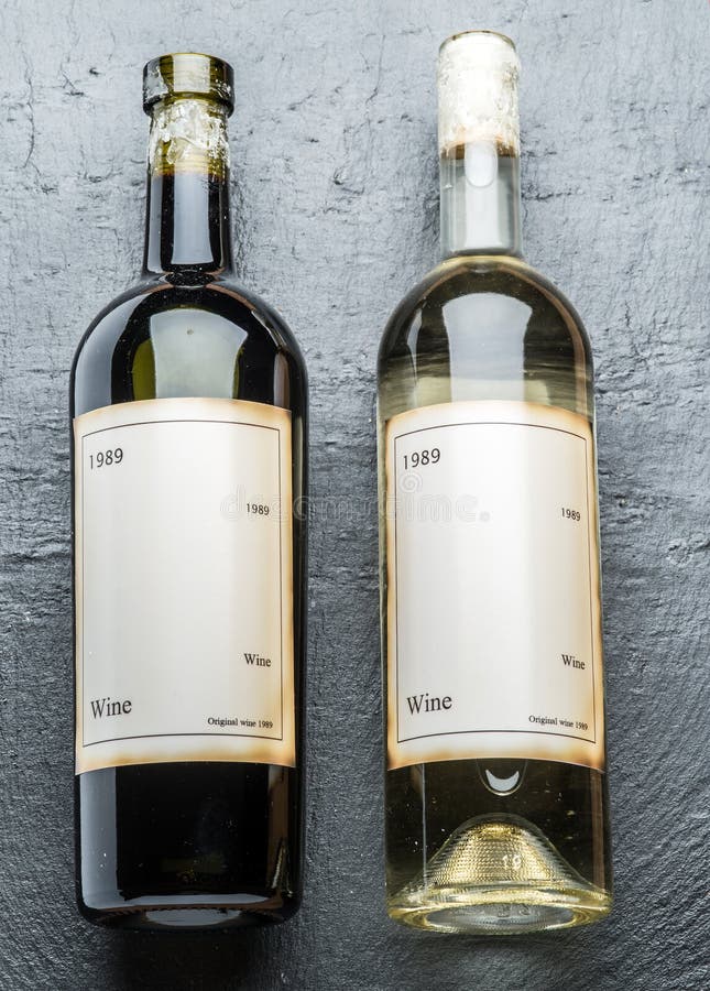 Two Wine Bottles on the Graphite Board Stock Image - Image of winery ...