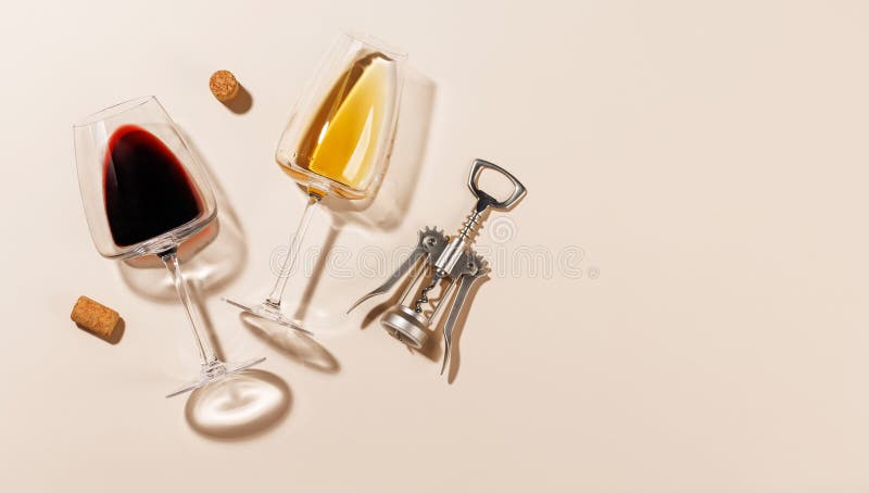 Two Wine Glasses Alongside a Corkscrew and Several Corks Stock Image ...