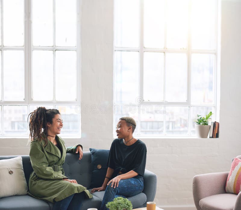 Two Woman Friends Talking Having Conversation Sitting on Sofa at Home ...