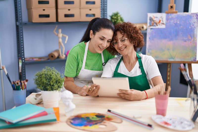 Two Women Artists Drawing on Notebook at Art Studio Stock Image - Image ...