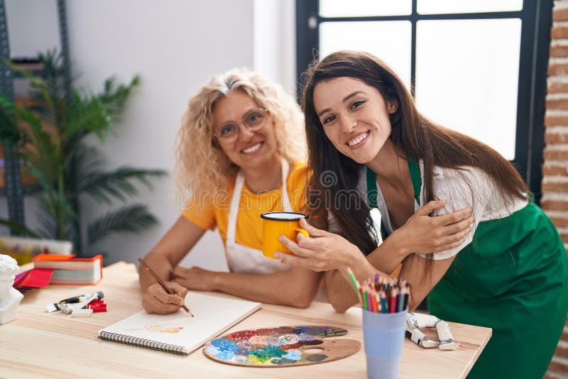 Two Women Artists Drinking Coffee Drawing at Art Studio Stock Photo ...