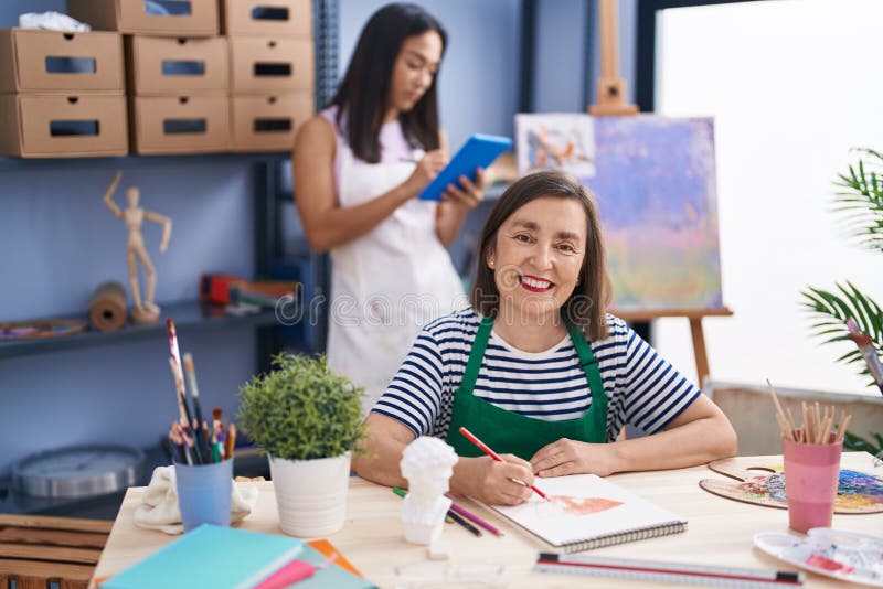 Two Women Artists Using Touchpad Drawing on Notebook at Art Studio ...