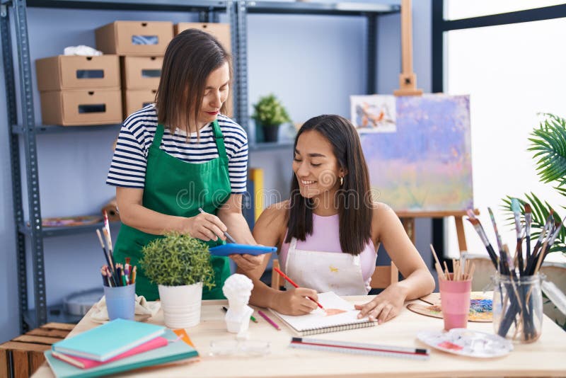 Two Women Artists Using Touchpad Drawing on Notebook at Art Studio ...