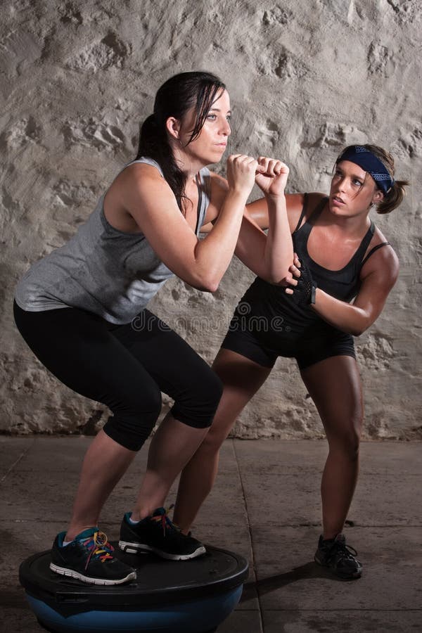 Two Women in Boot Camp Balance Training Stock Photo - Image of conditioning, european: 27393584
