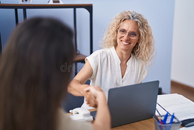 Two Women Business Workers Shake Hands at Office Stock Image - Image of ...
