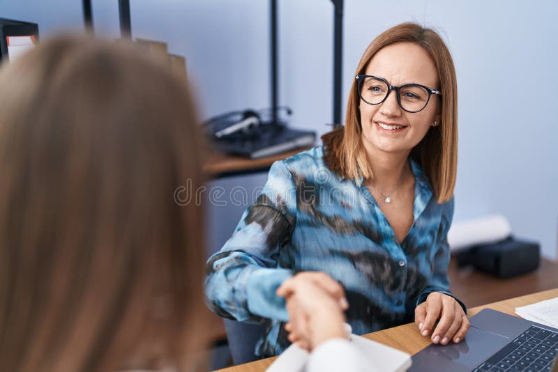 Two Women Business Workers Shake Hands at Office Stock Image - Image of ...