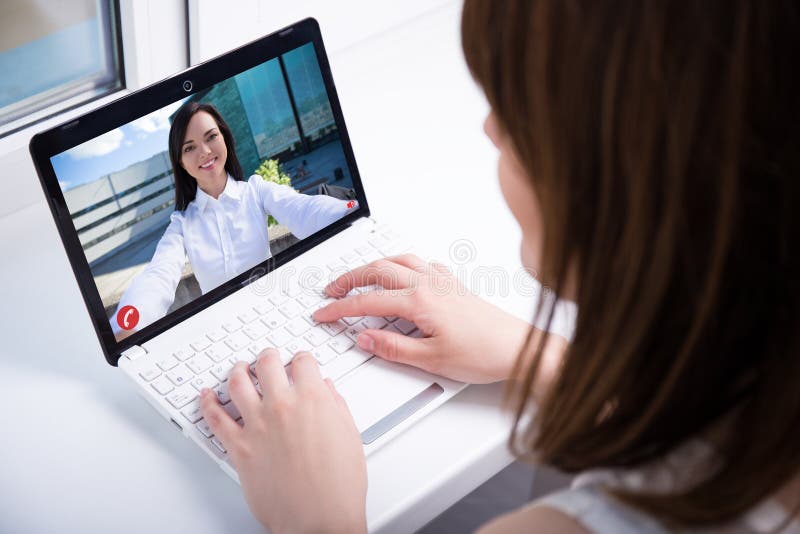 Two Women Chatting Over a Video Call Stock Photo - Image of rear ...