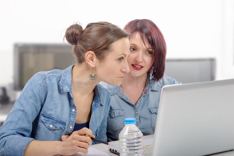 Two Women College Working on Laptop Computer Stock Image - Image of ...