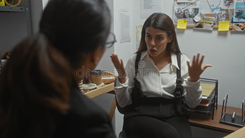 Two Women Detectives in Office Discussing a Missing Person Case with ...