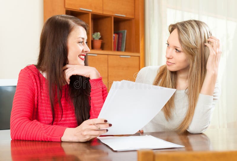 Two Women Discussing a Contract Stock Image - Image of work, reading ...