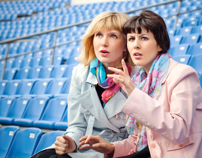 Two Women Fans Watching Competition Stock Image - Image of outdoor ...