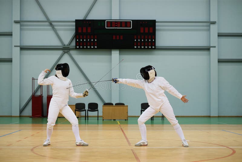 Two Women on a Fencing Training Stock Photo - Image of outfit ...