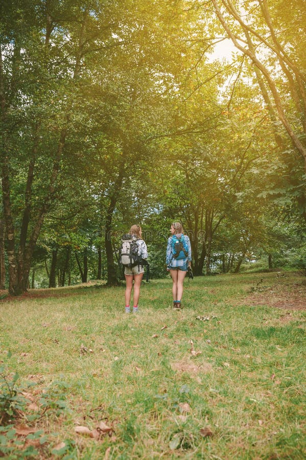 Women Friends Laughing while Walking in Forest Stock Photo - Image of ...