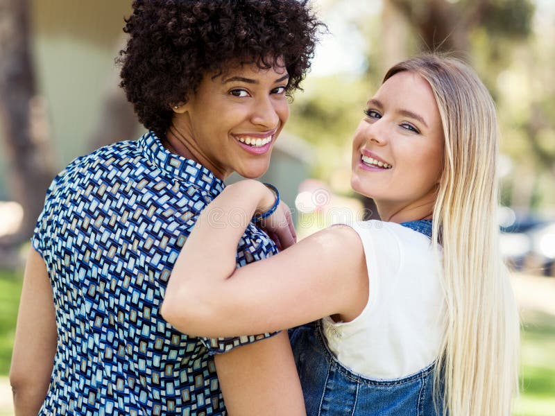 Two women friends in park stock image. Image of interestingly - 78731567