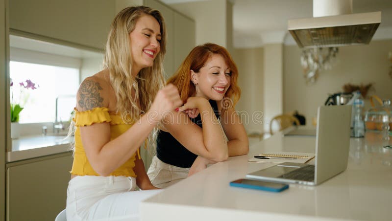 Two Women Having Video Call Sitting on Table at Kitchen Stock Image ...