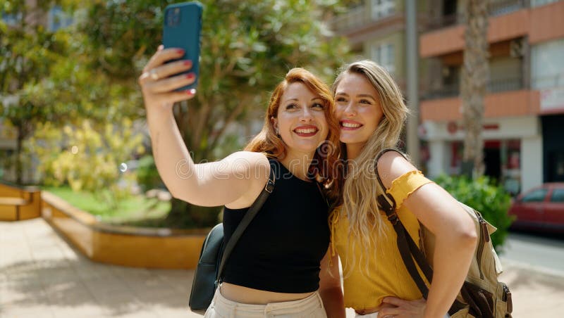 Two Women Hugging Each Other Making Selfie by Smartphone at Park Stock ...