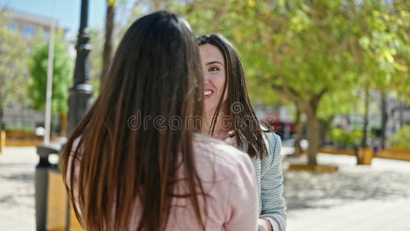 Two Women Hugging and Smiling at Each Other in Office Stock Footage ...