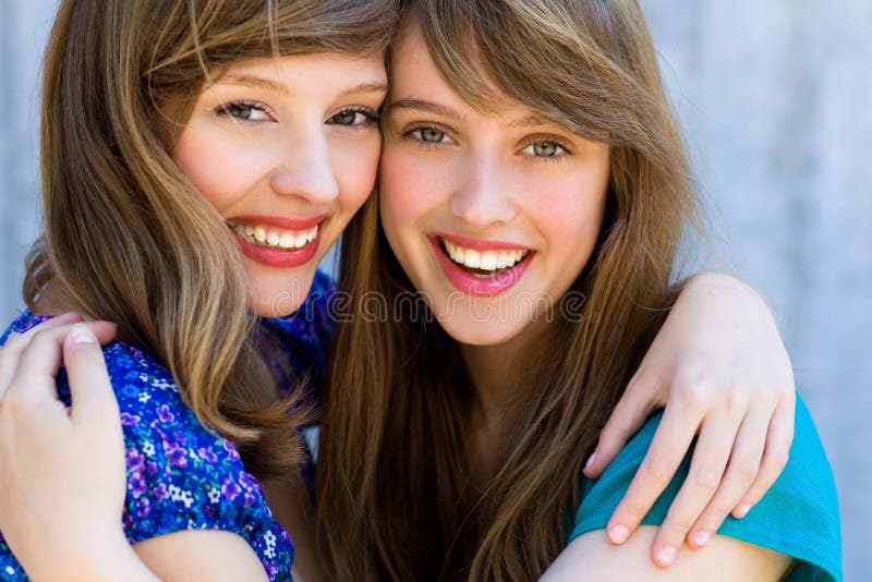 Two Women Hugging and Smiling Stock Photo - Image of attractive ...