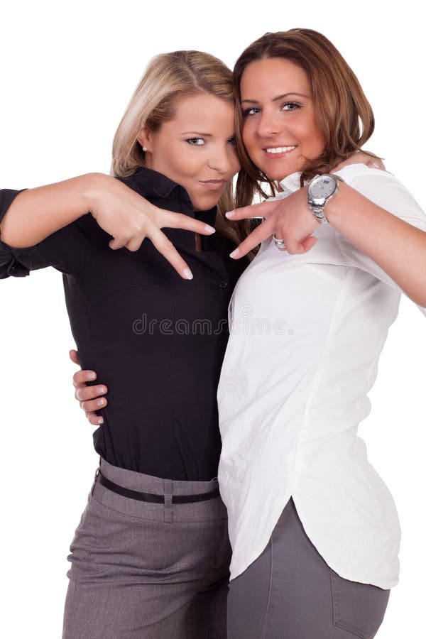 Two women making V-signs stock photo. Image of relationship - 29348224